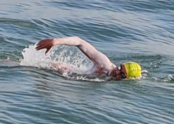Mark Farmer completes historic swim - Barbados Today