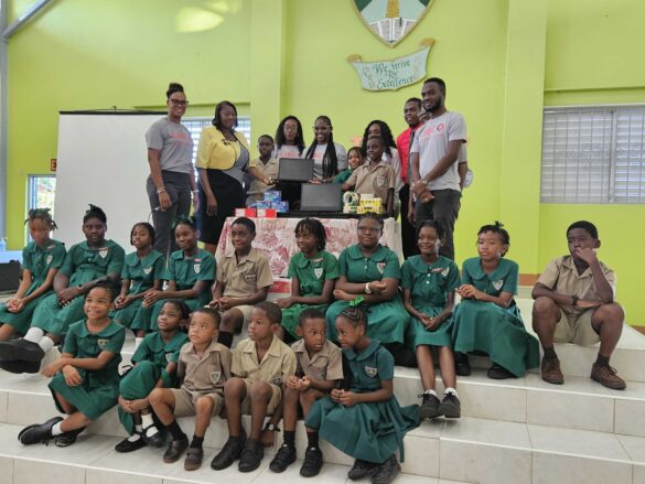 Bank donates laptops to SDA Primary School - Barbados Today